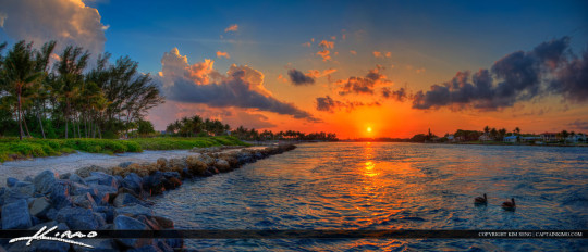Jupiter Inlet Park Sunset at Jetty with Pelicans - Royal Stock Photo