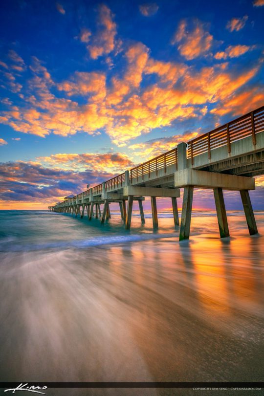 Juno Beach Pier Sunrise Vertical Rich Wave Flow | Royal Stock Photo