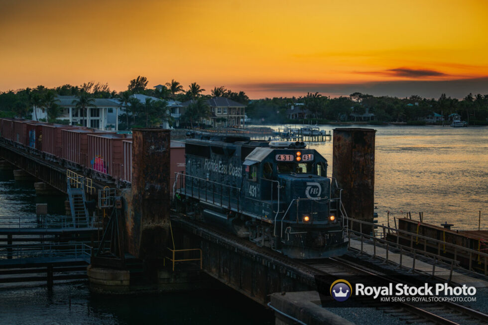 Florida East Coast Train Sunset at Jupiter Train Track | Royal Stock Photo