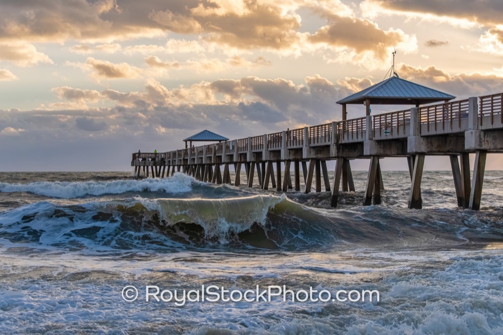 Early morning view of Juno Beach Pier Juno Beach Florida with dramatic ...