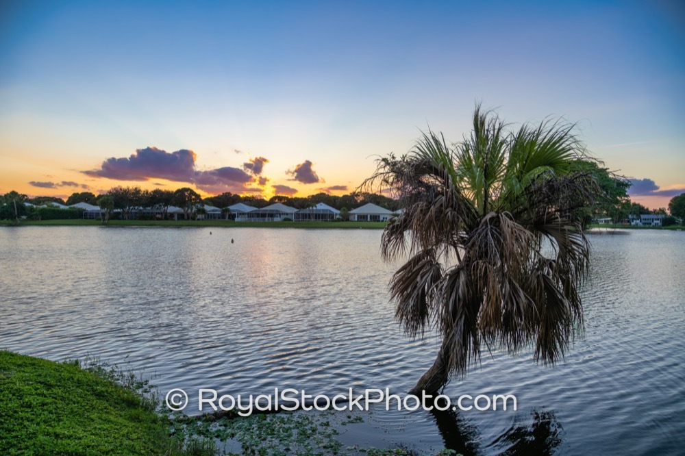 Sunset Reflections Enhance Waterfront Serenity at Lake Catherine Park ...
