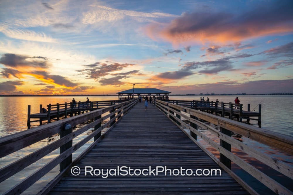 Captivating Coastal Scene Showcases Golden Hour Fishing Activities at ...