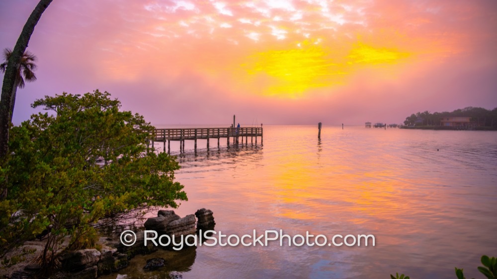 Vivid Sunrise Reveals Tranquil Waterscape at Castaways Point Park Palm ...